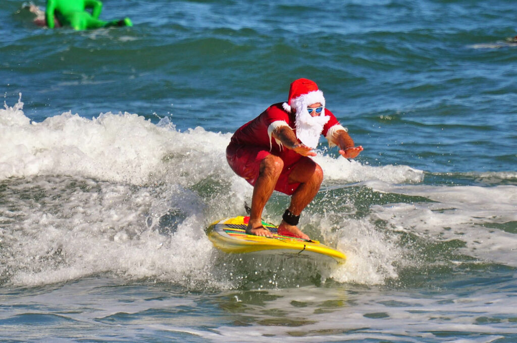About Us - Surfing Santas