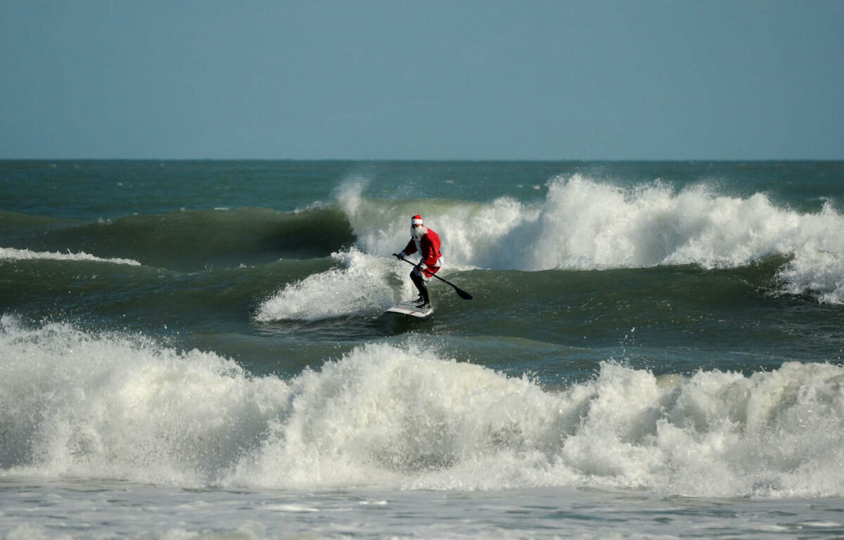 About Us - Surfing Santas